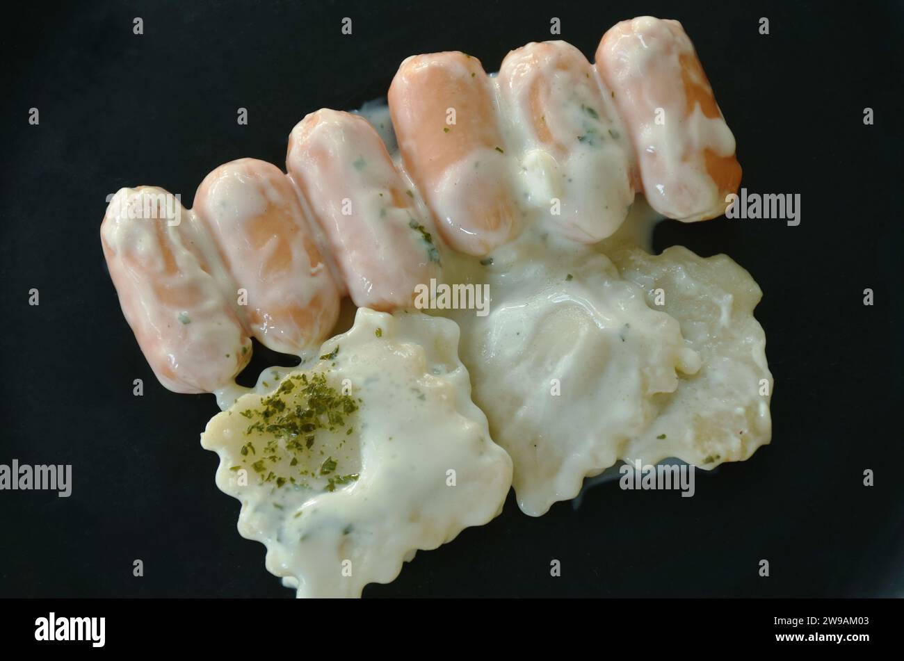 steamed Ravioli with pork sausage dressing carbonara white sauce ...