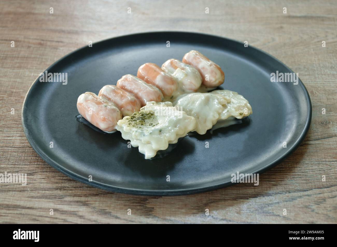 steamed Ravioli with pork sausage dressing carbonara white sauce ...