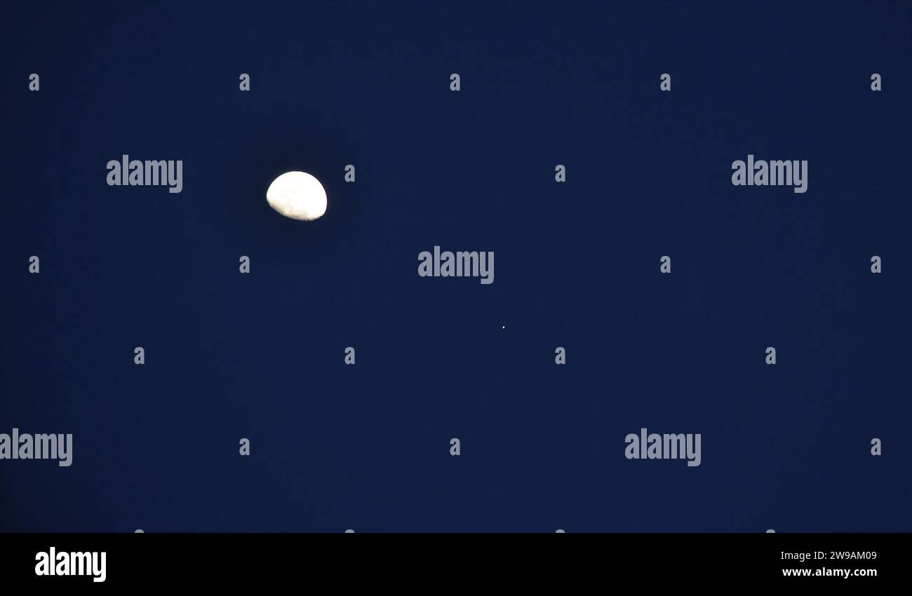 half moon and Venus arranging on sky in night Stock Photo - Alamy