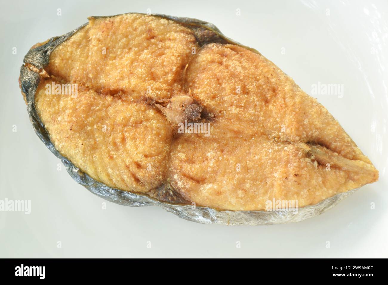 deep fried Indo-Pacific king mackerel fish dressing slice mango with ...