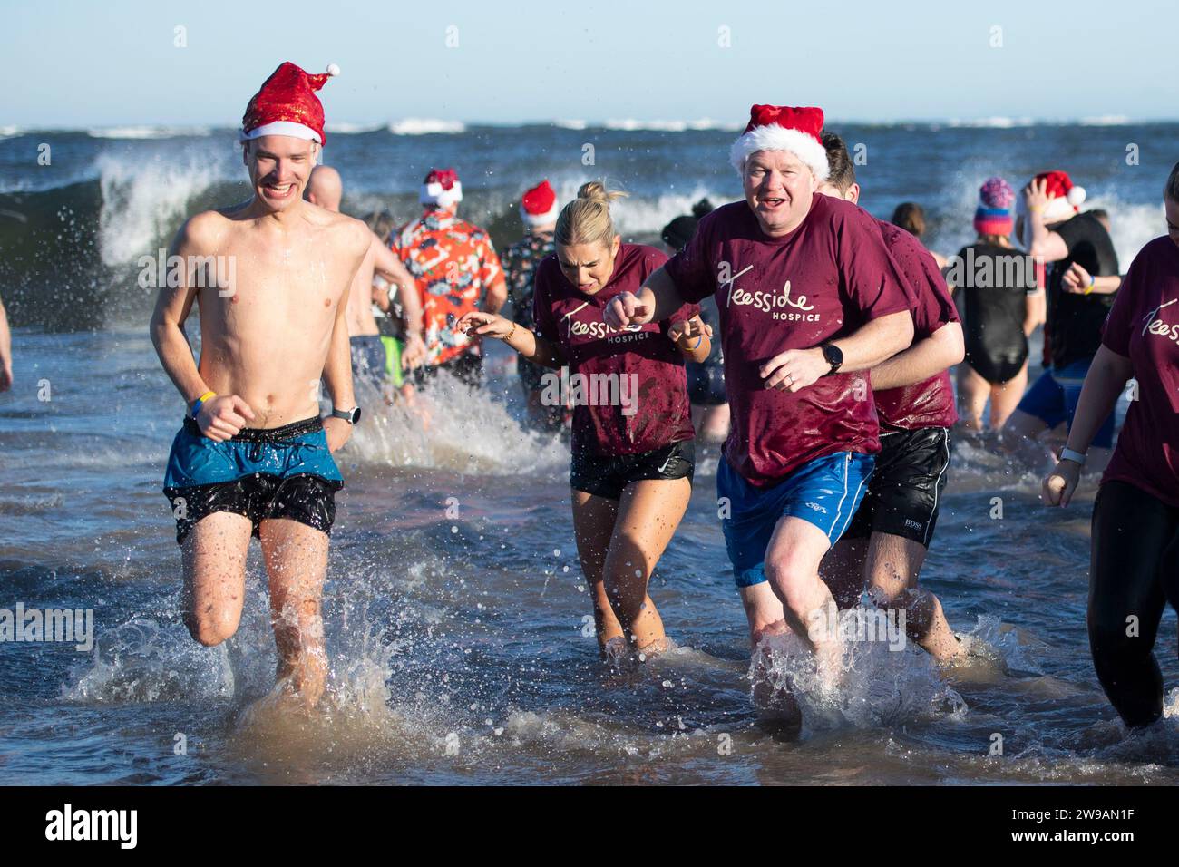 Bold Boxing Day dippers brave the icy waters of North Sea during the ...