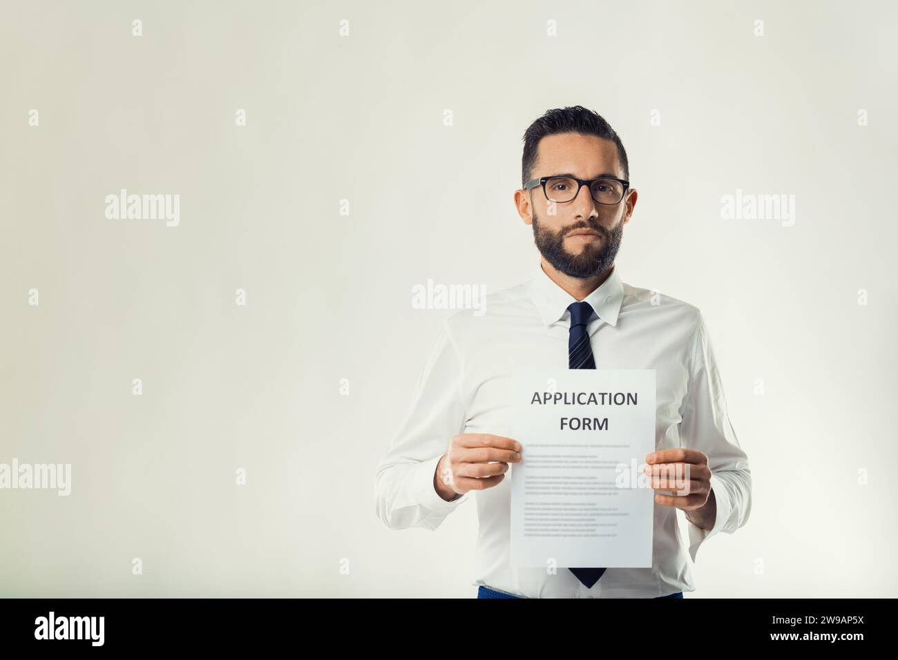 Career-driven professional confidently displays an application ...