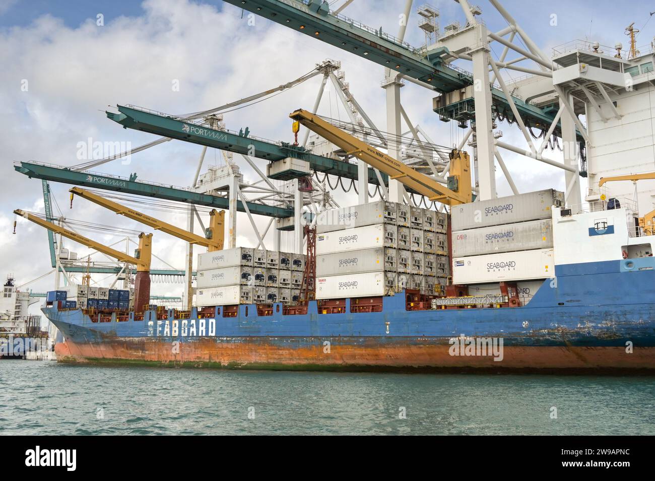 Miami, Florida, USA - 1 December 2023: Dockside cranes unloading the ...