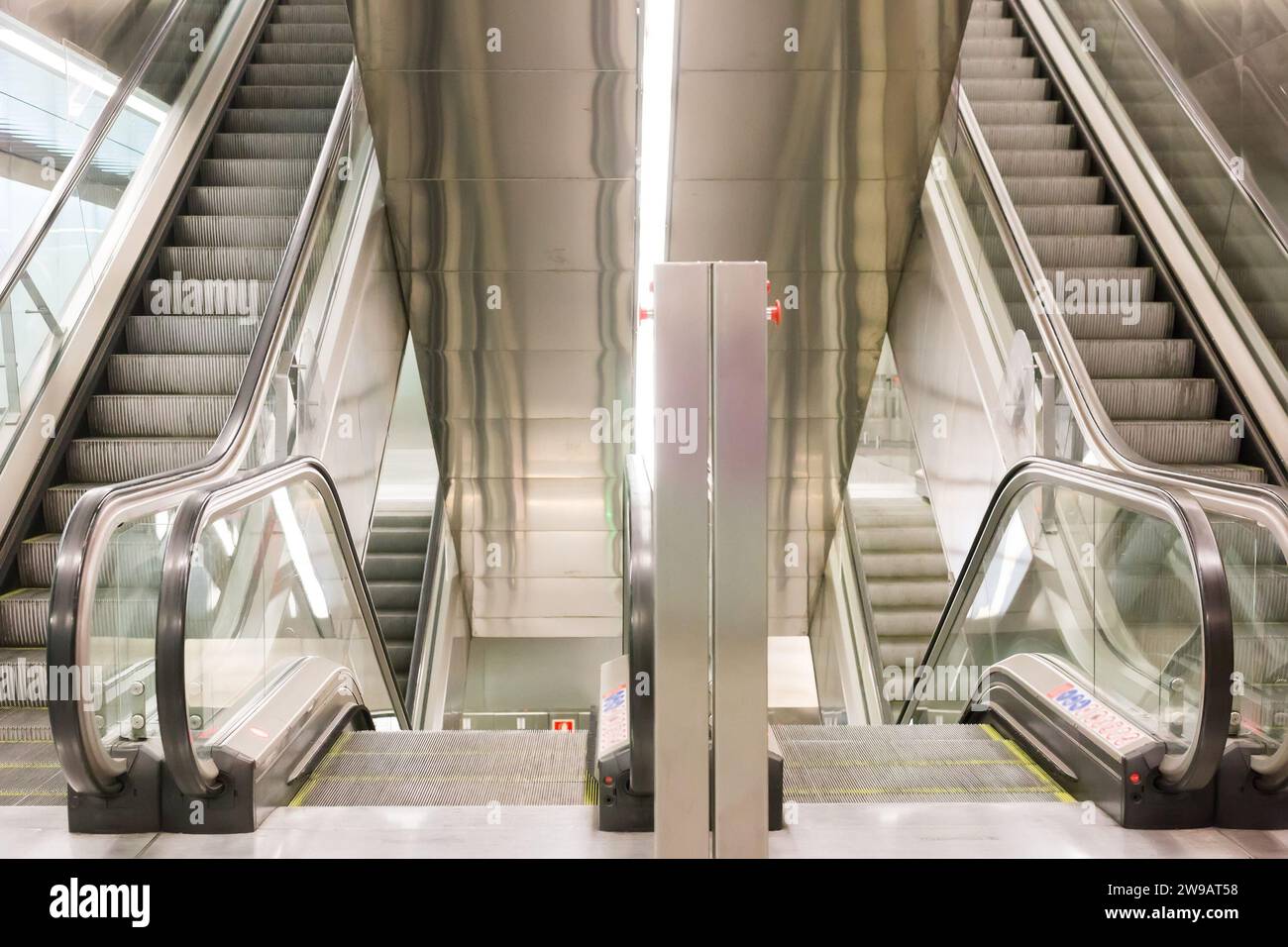 Line escalators with metal coating Stock Photo - Alamy