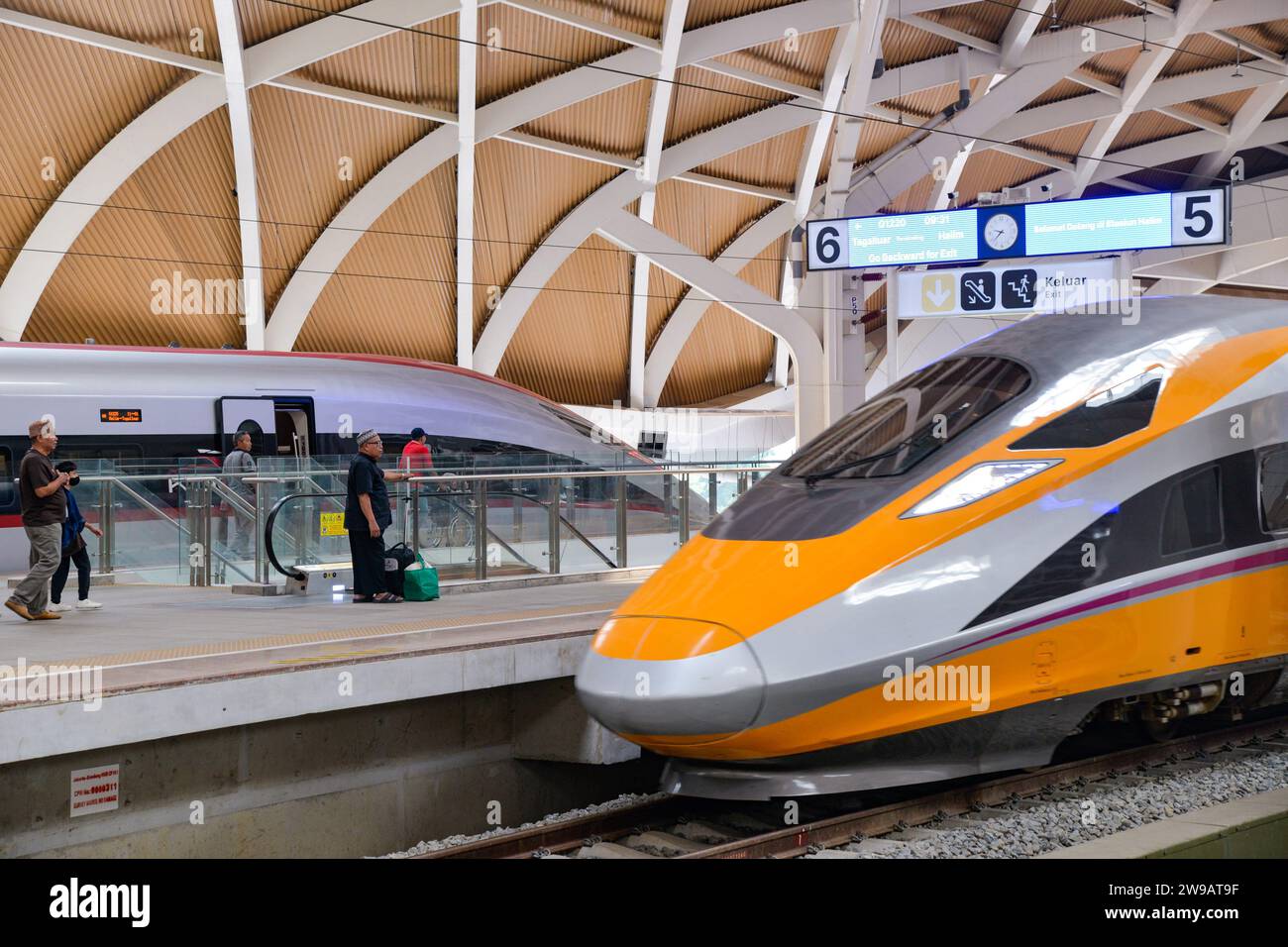 Jakarta, Indonesia. 25th Dec, 2023. A comprehensive inspection train (R) enters the platform of ...