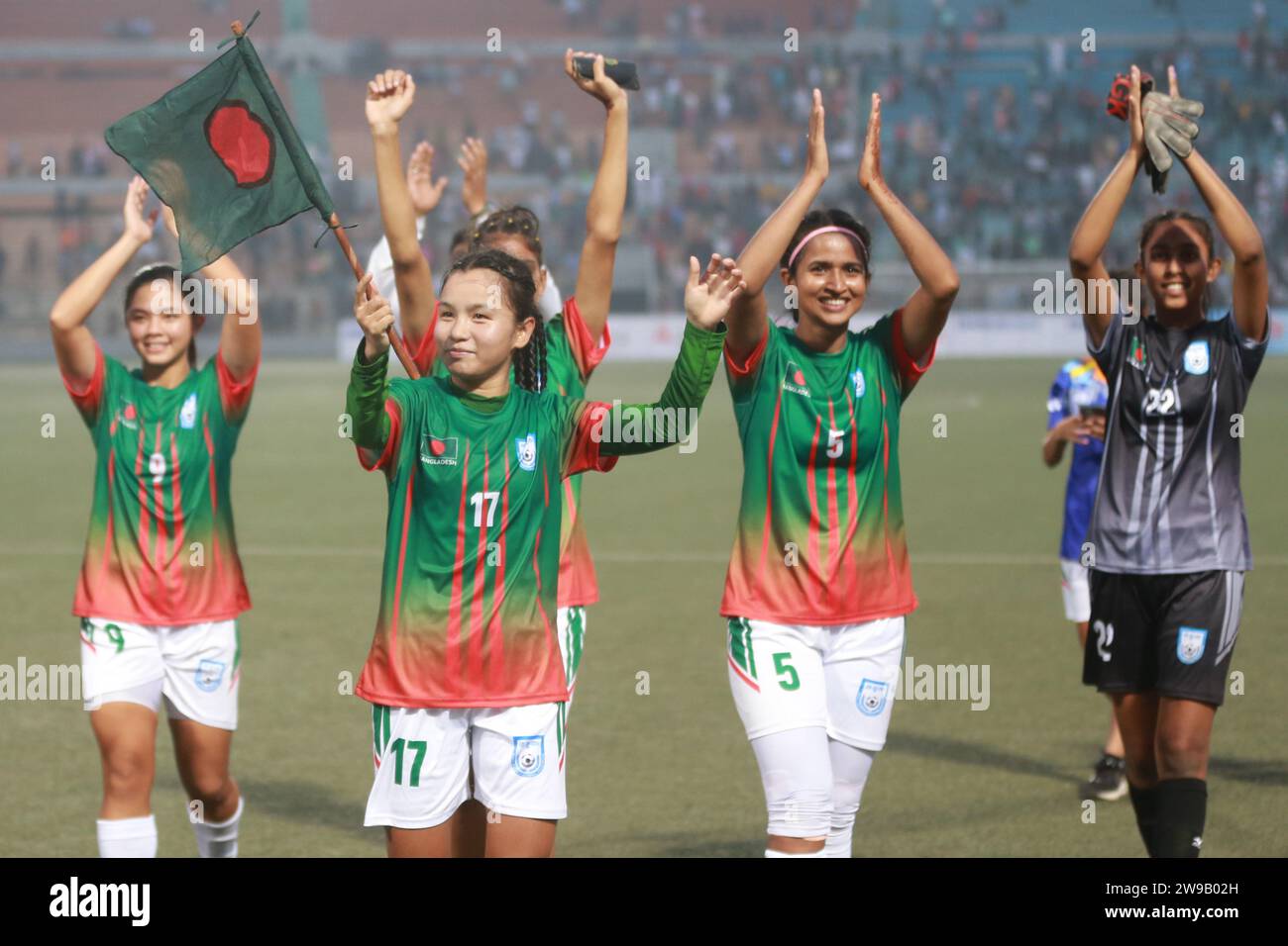 Bangladeshi footballers celebrate after win against Singapore in their ...