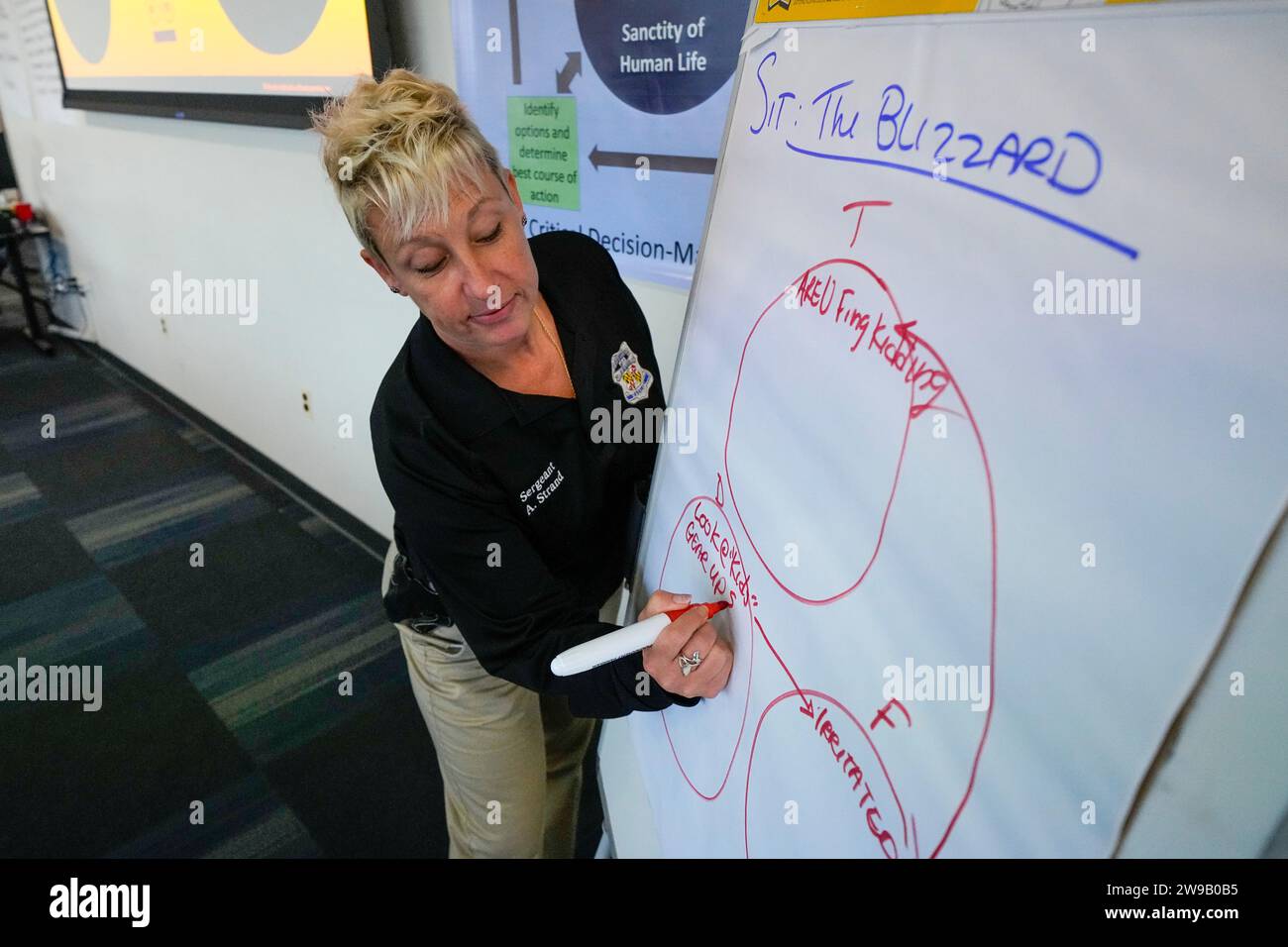 Baltimore Police Department Sgt. Amy Strand leads a professional ...