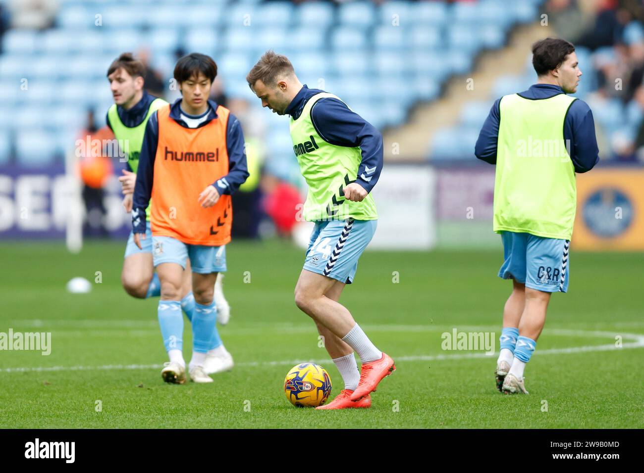 Coventry City's Matthew Godden (centre) warming up prior to kick-off ...