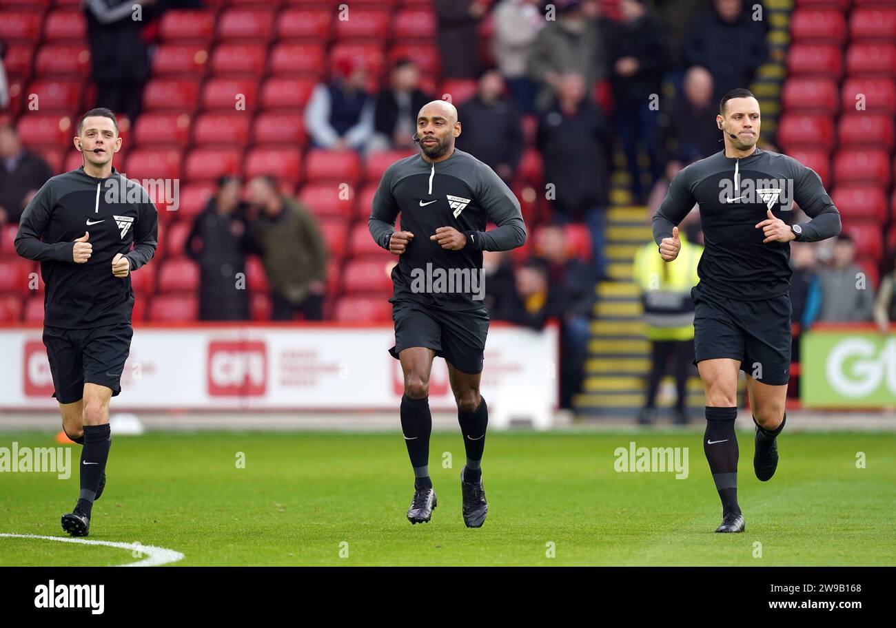Referee Sam Allison (centre) ahead of the Premier League match at ...