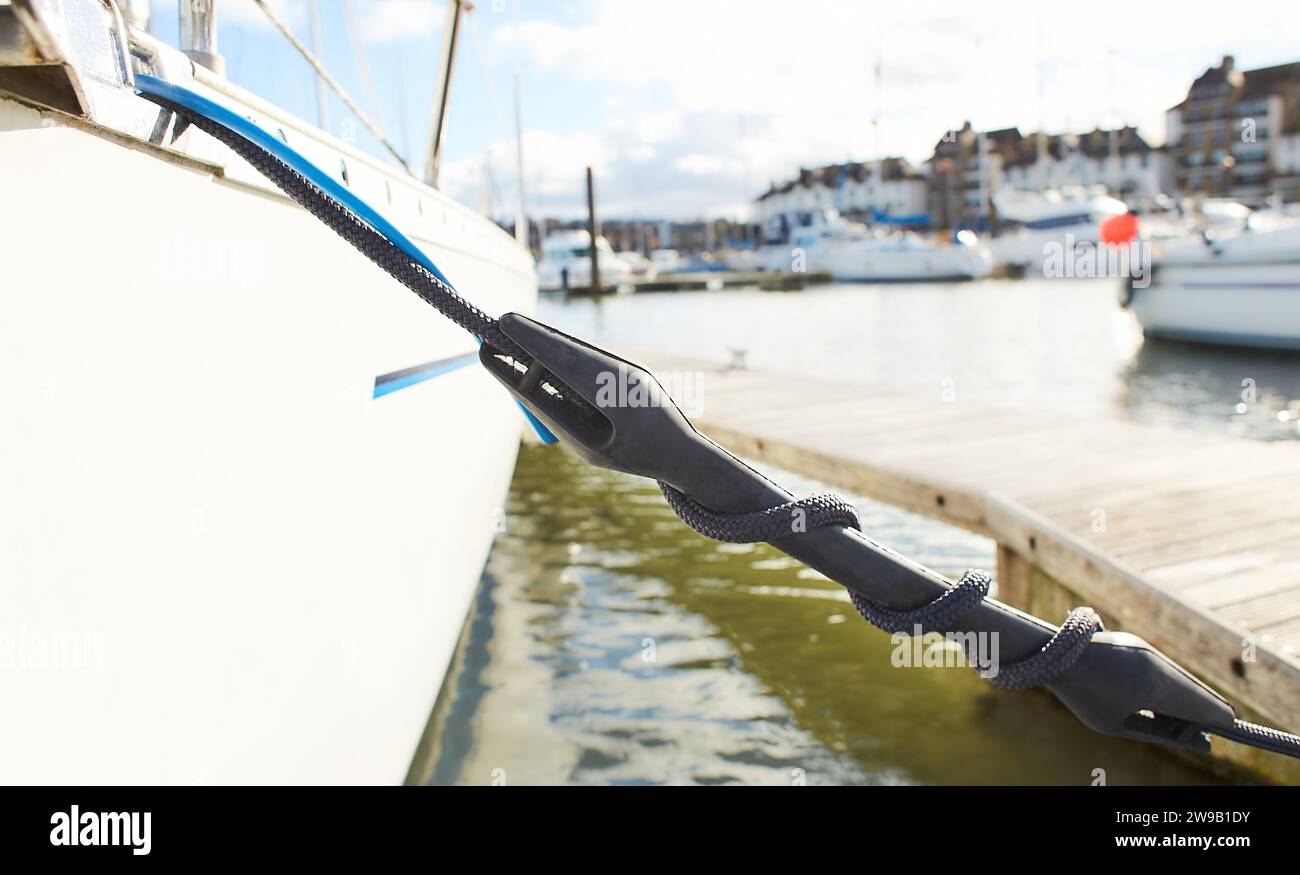 Mooring compensator of rope tension. Detail of boat Stock Photo - Alamy