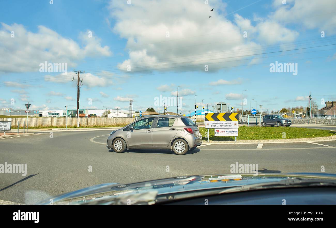 Portlaoise, Ireland - 03.04.2022: Rear view of cars driving on street ...