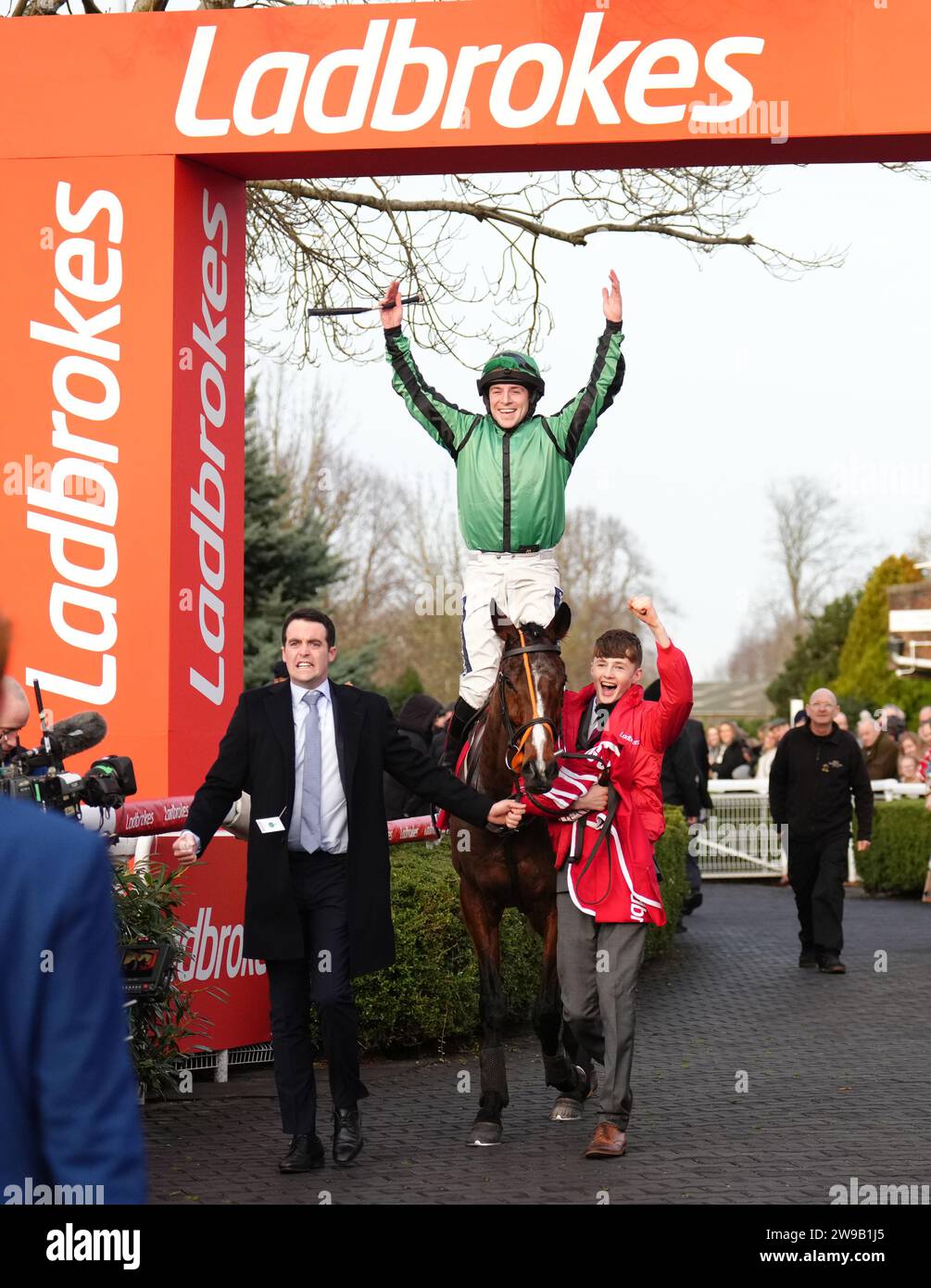 Jockey Gavin Sheehan celebrates winning The Ladbrokes King George VI ...