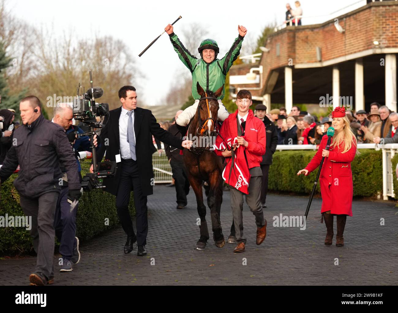 Jockey Gavin Sheehan celebrates winning The Ladbrokes King George VI ...