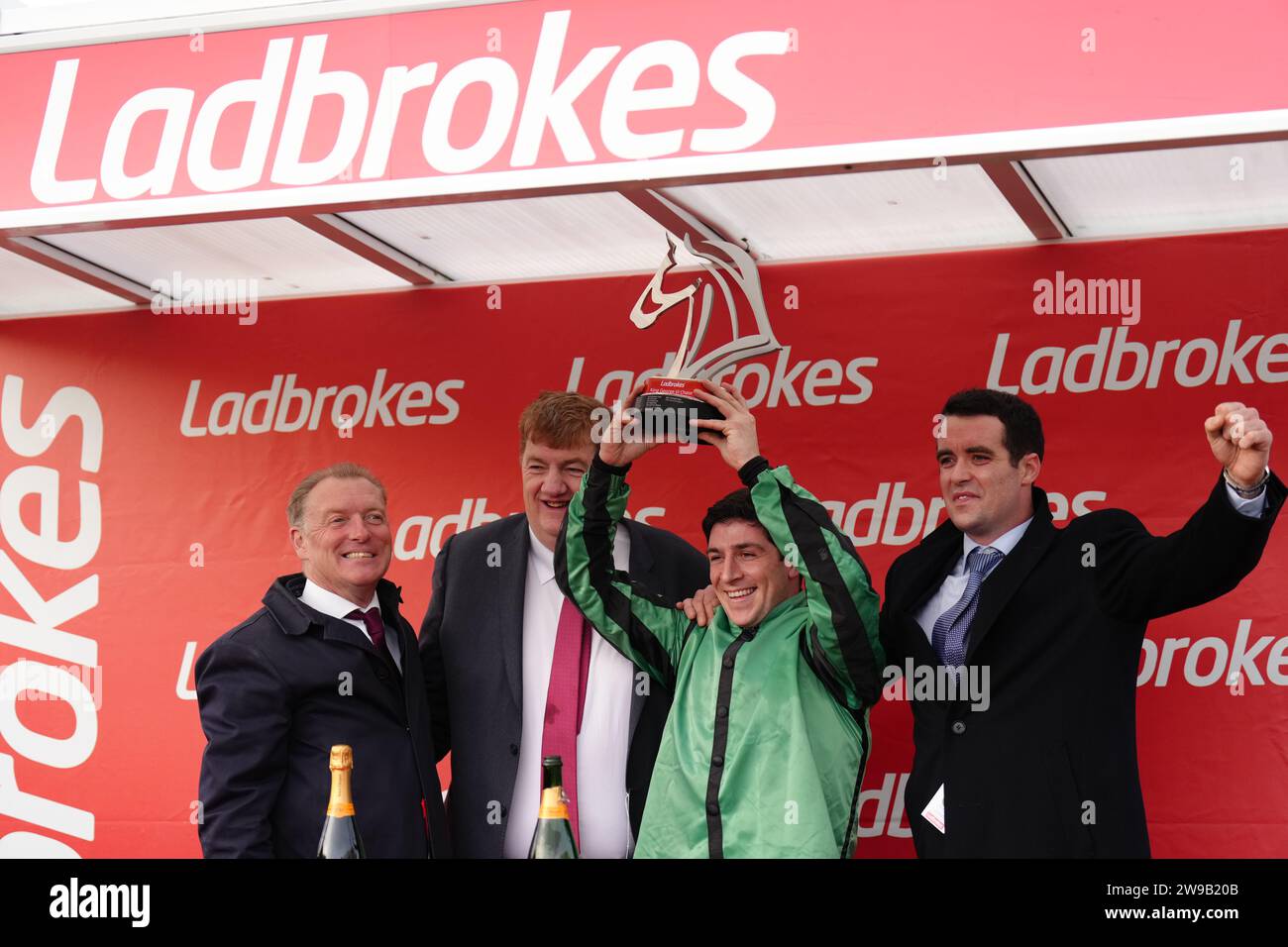 Jockey Gavin Sheehan (second right), Trainer John "shark" Hanlon ...