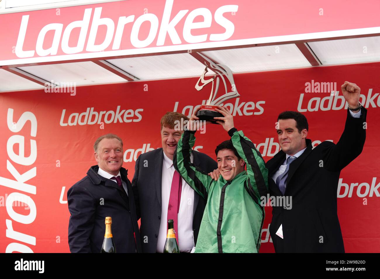 Jockey Gavin Sheehan (second right), Trainer John "shark" Hanlon ...