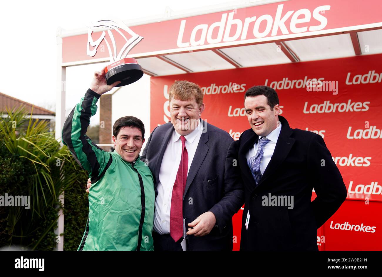 Jockey Gavin Sheehan (left), Trainer John "shark" Hanlon (centre) and ...