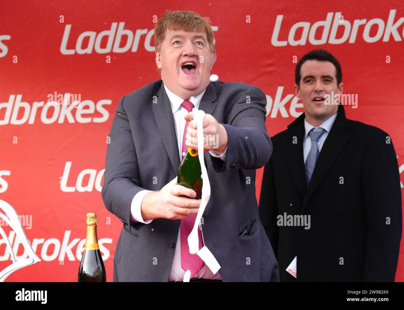 Trainer John "shark" Hanlon and owner TJ McDonald celebrate Hewick ...