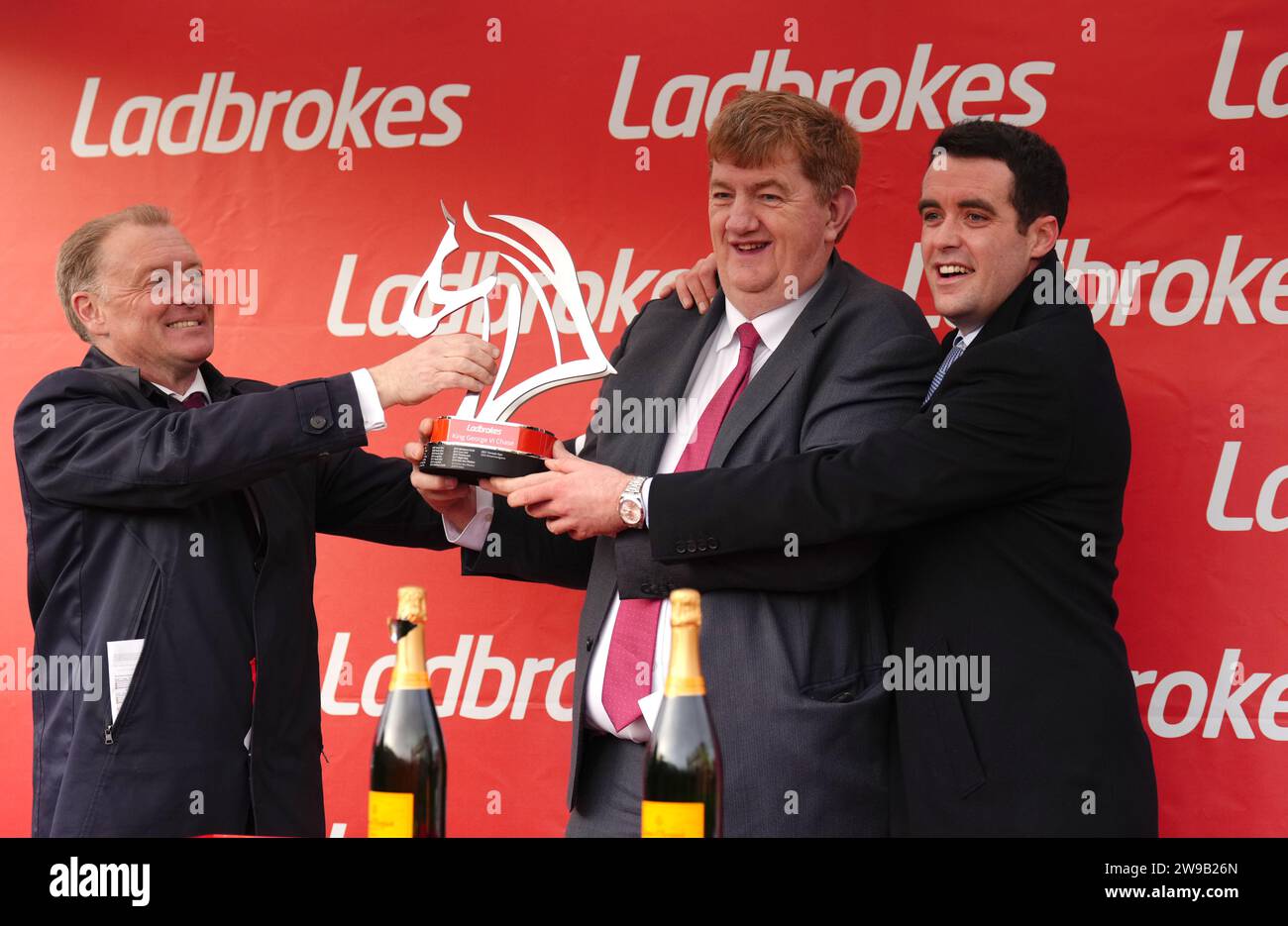 Trainer John "shark" Hanlon (centre) and owner TJ McDonald celebrate ...