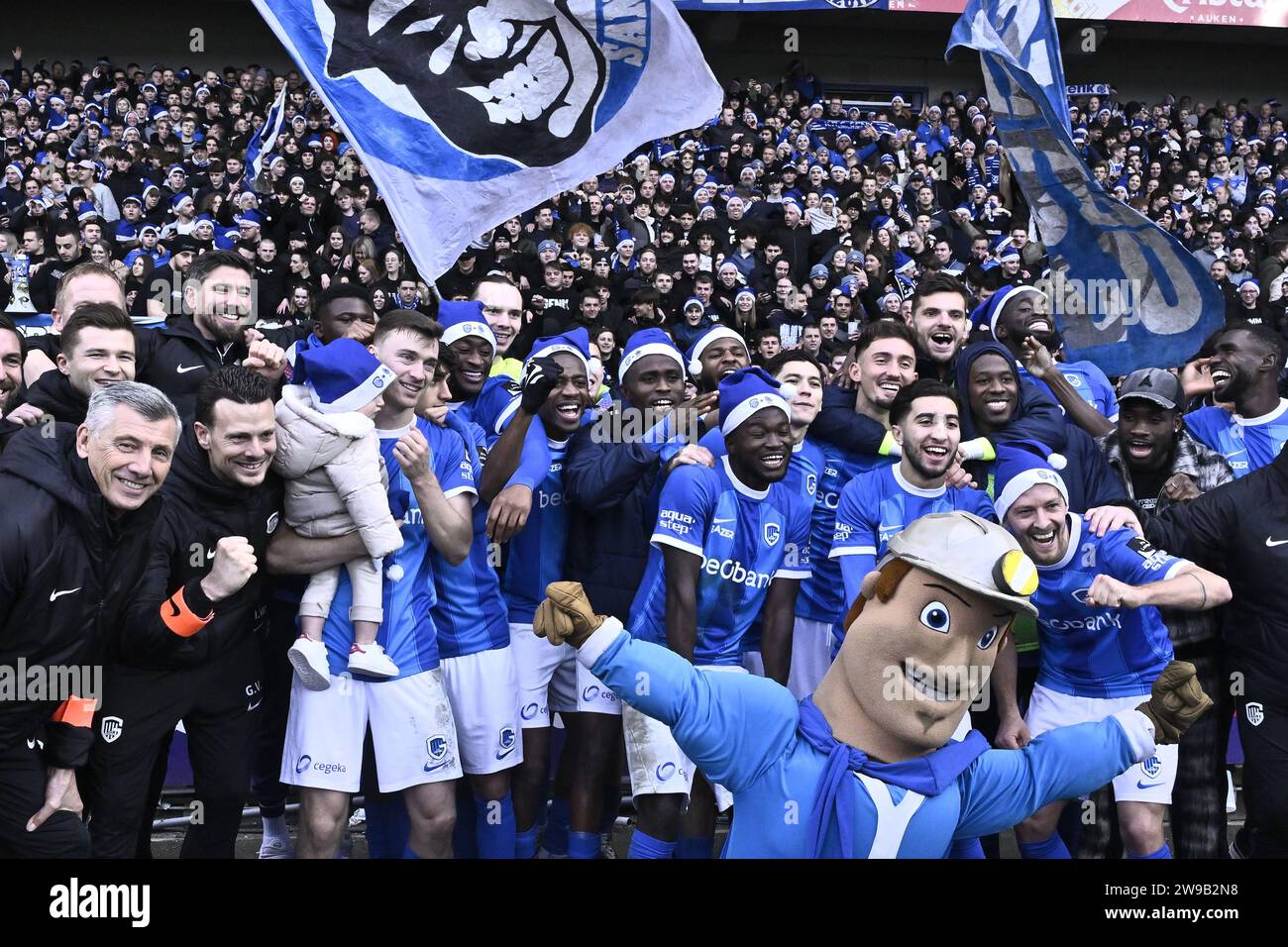 Genk, Belgium. 26th Dec, 2023. Genk's players celebrate after winning a ...