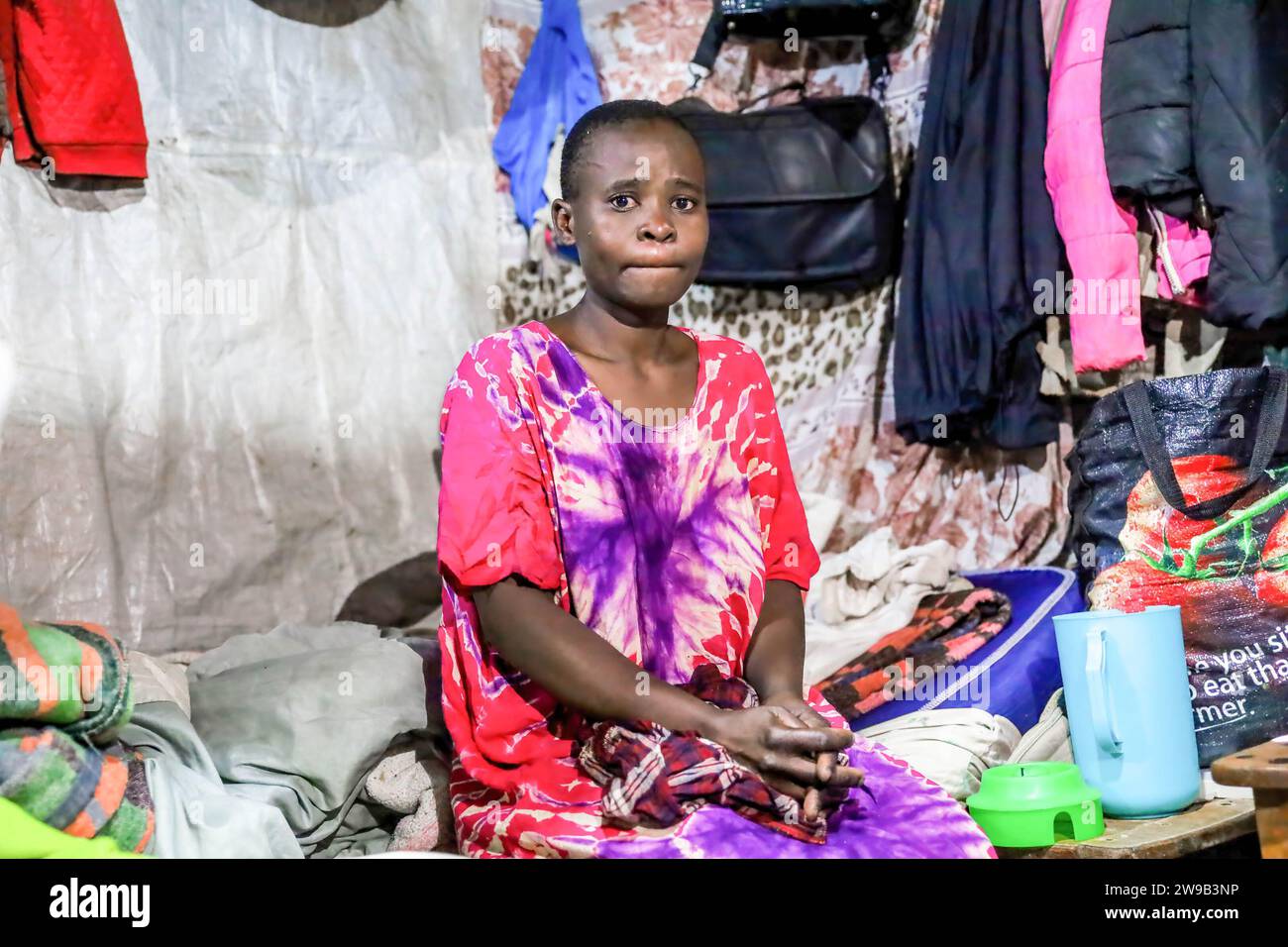 Lilian Atieno seen seated at her house in Kibera Slum, Nairobi. 35-Year ...
