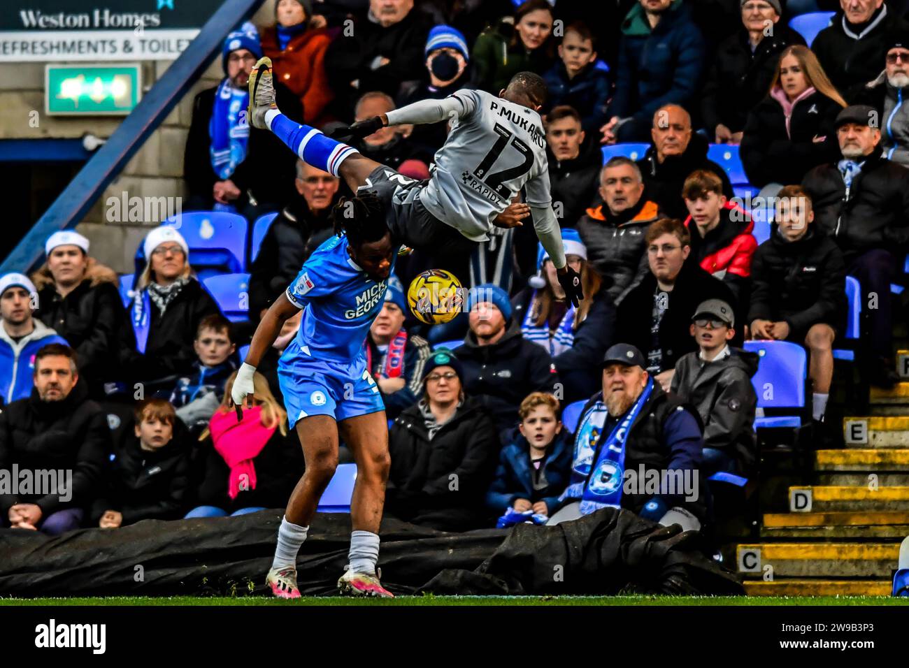 Peter Kioso (30 Peterborough United) challenges Caylan Vickers (12 ...