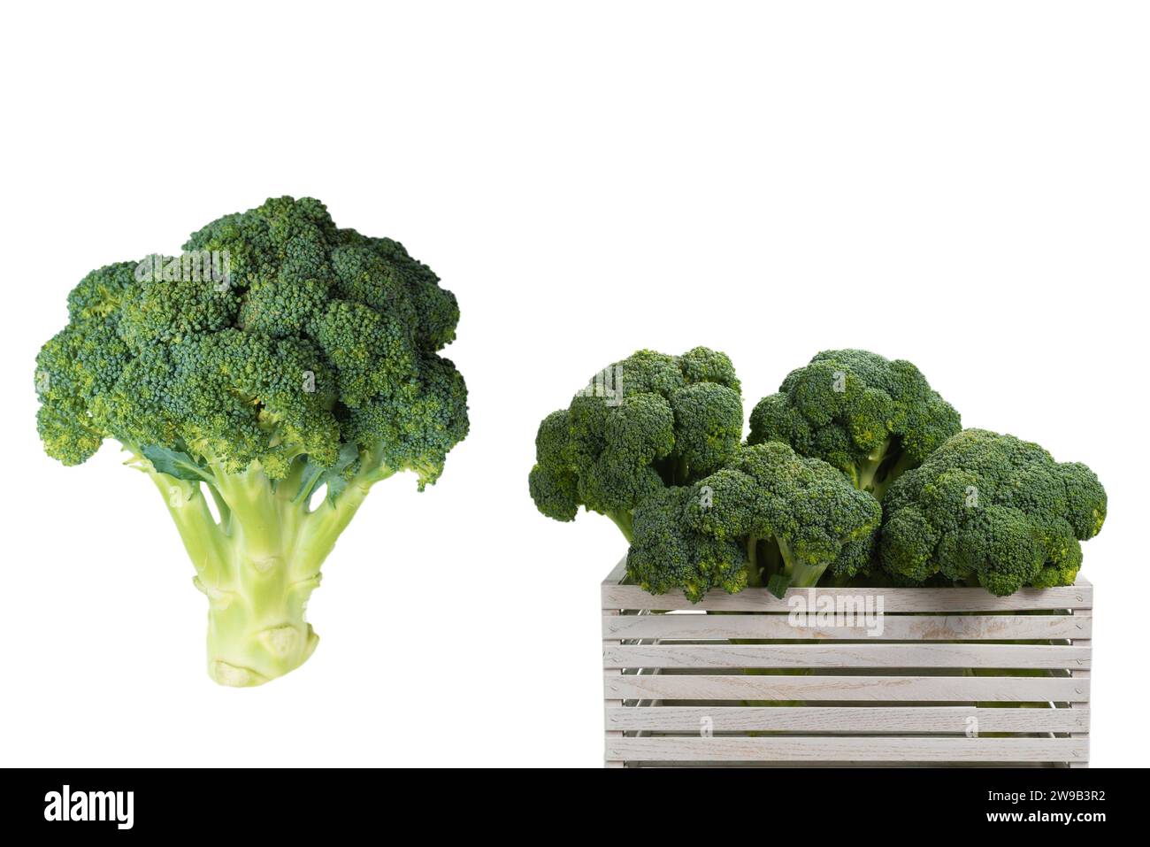 Fresh tasty broccoli in wooden box isolated on white background Stock ...