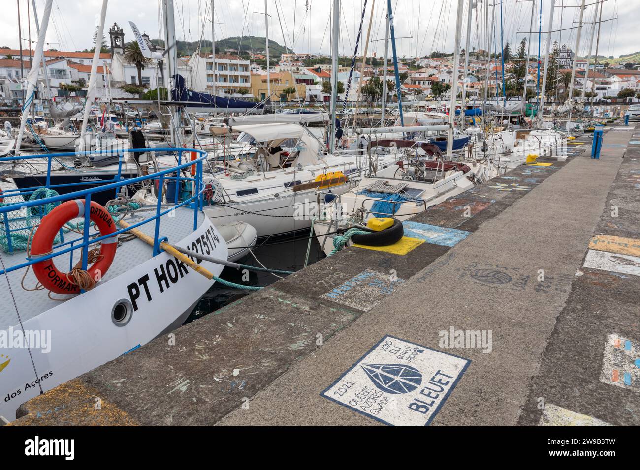 Sailing boats anchoring at marina of Horta harbour, Faial Island ...