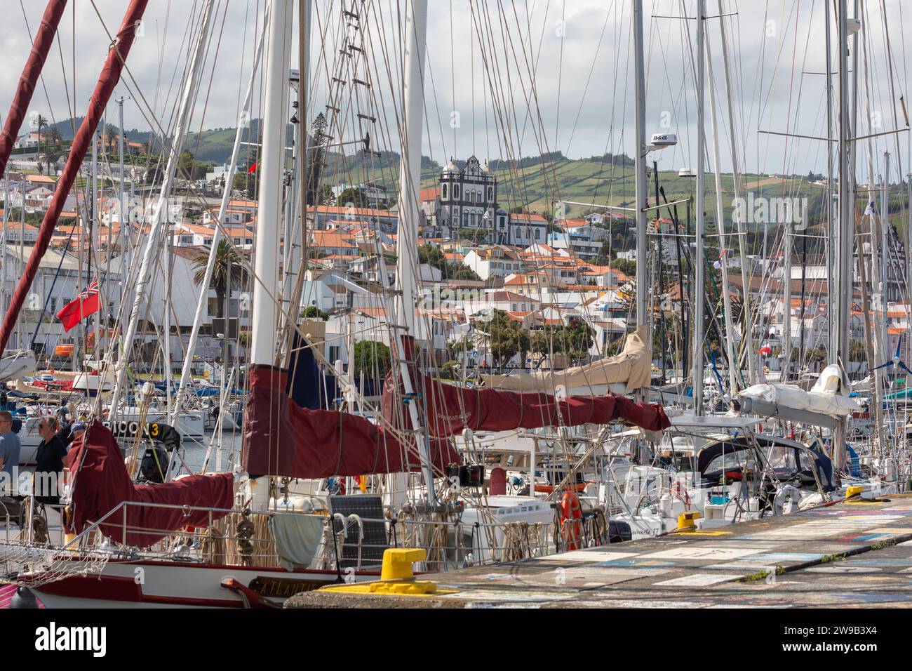 Sailing boats anchoring at marina of Horta harbour, Faial Island ...