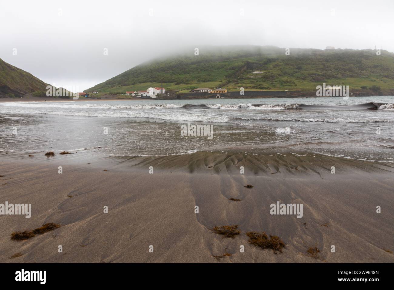 Deserted sandy beach of Horta at low tide, Faial Island, Azores Stock ...
