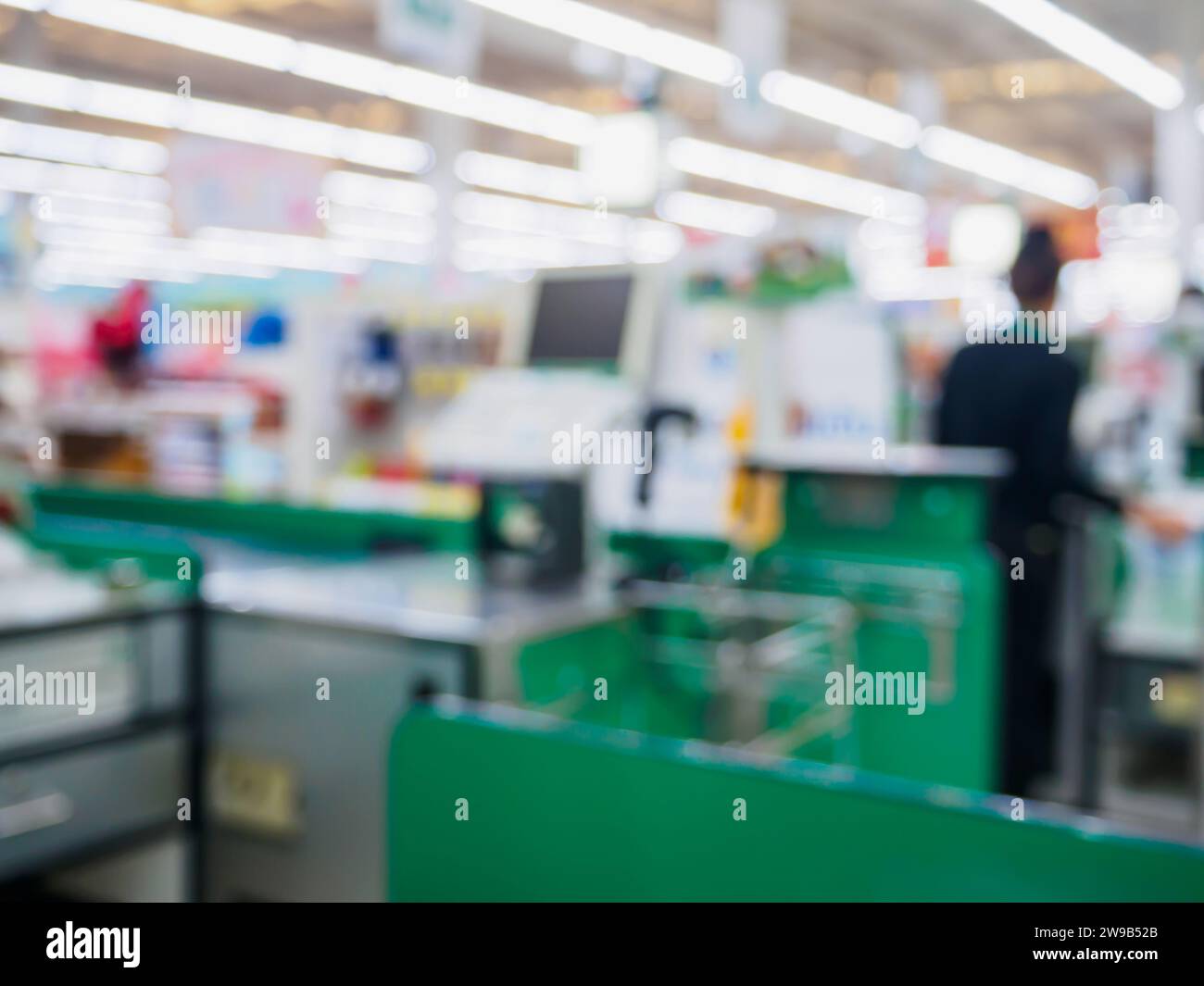 supermarket checkout cashier counter in store blurred background Stock ...