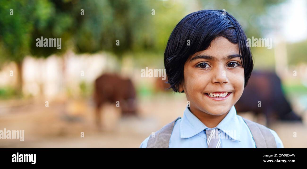 Kid, smile and portrait of student with books for education, study or ...