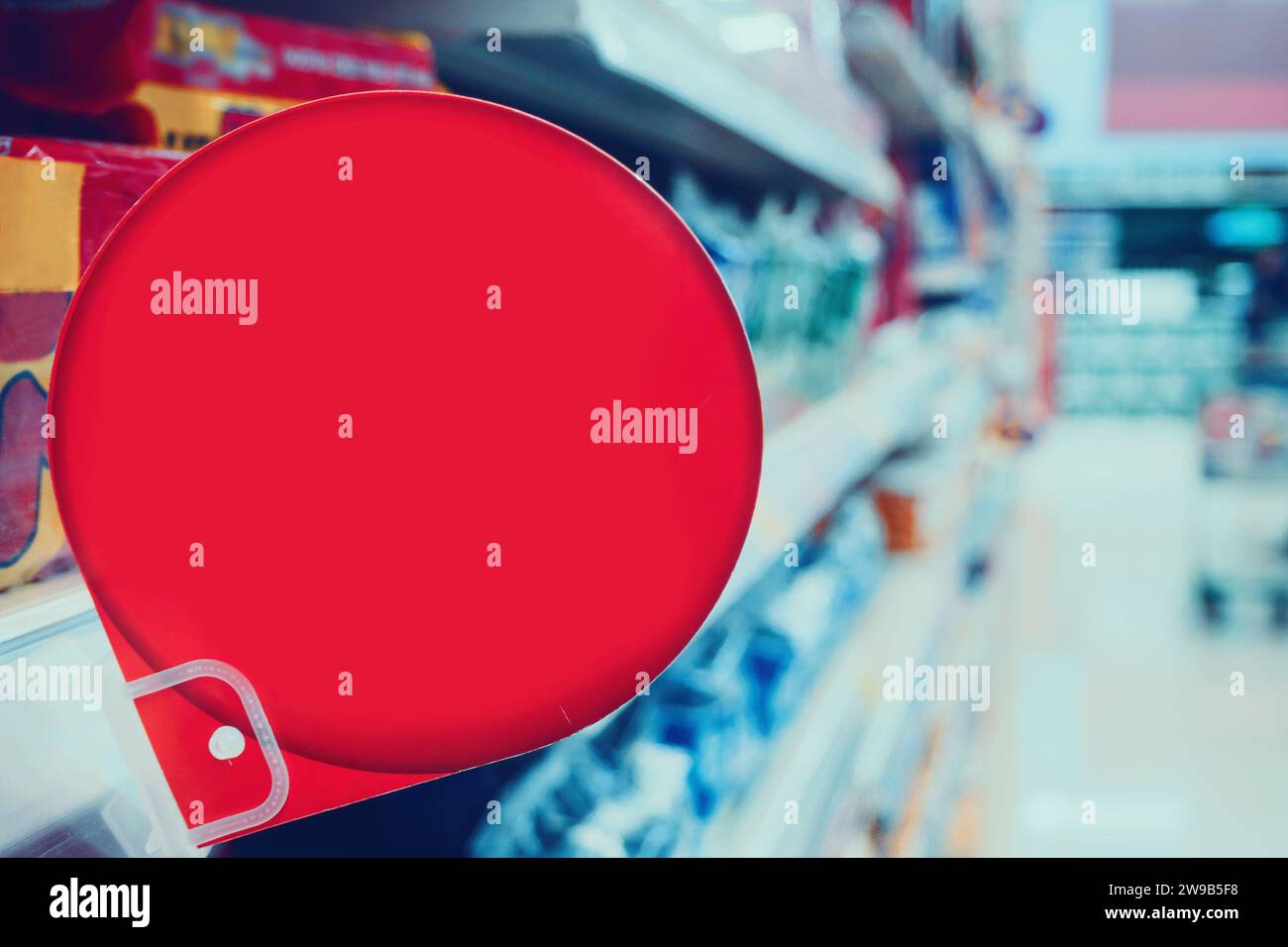 blank red discount sign display on supermarket shelves Stock Photo - Alamy