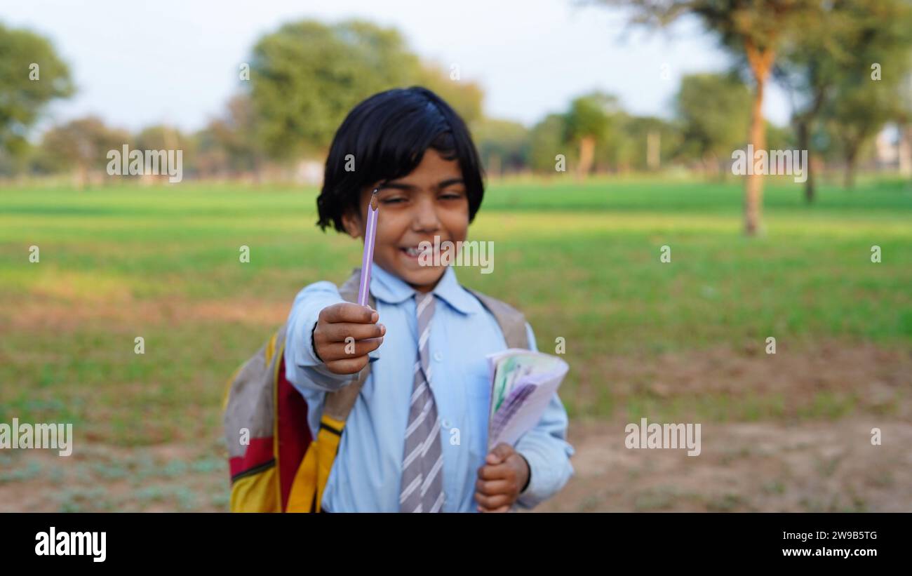 Kid, smile and portrait of student with books for education, study or ...