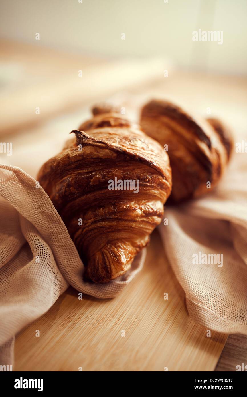 Two golden brown color, with typical crescent shape and flaky, buttery ...