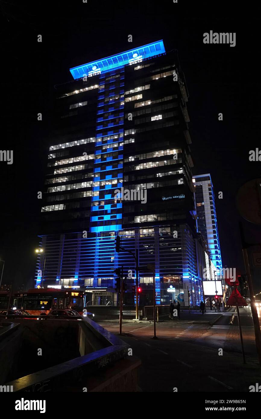 Vertical dark closeup on the blue illuminated UBB Headquarter ...