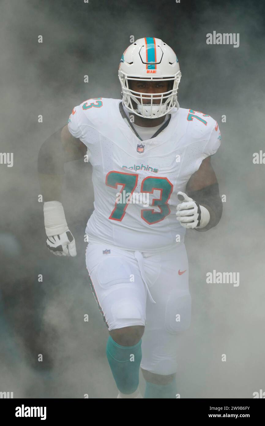Miami Dolphins offensive lineman Austin Jackson (73) runs onto the ...