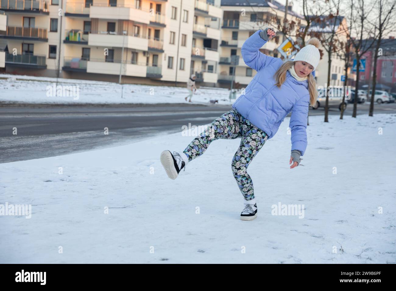 The woman stumbled while walking and falls backwards Stock Photo - Alamy
