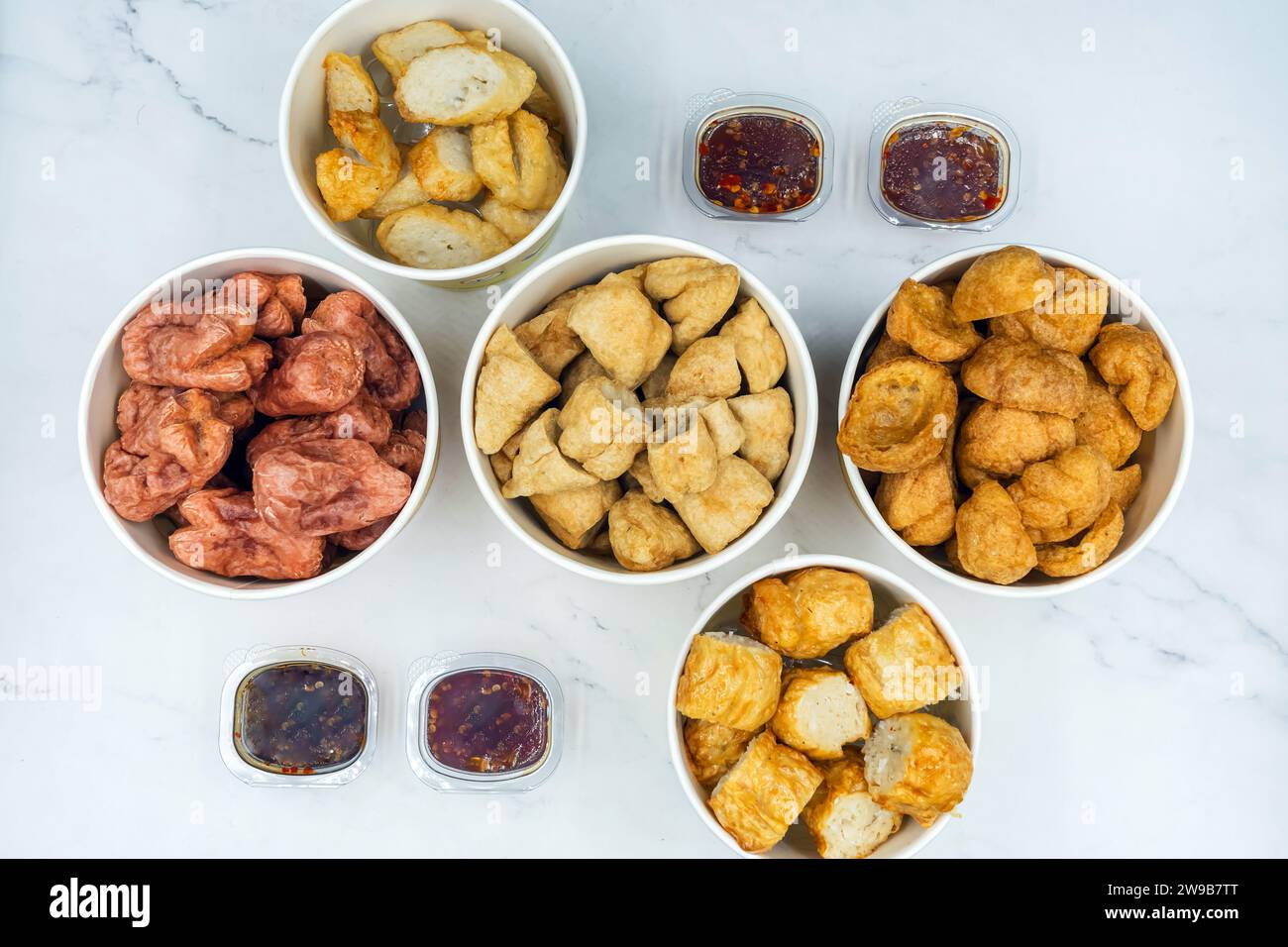 The fried meatballs made from a variety of meats and sausages, mixed ...