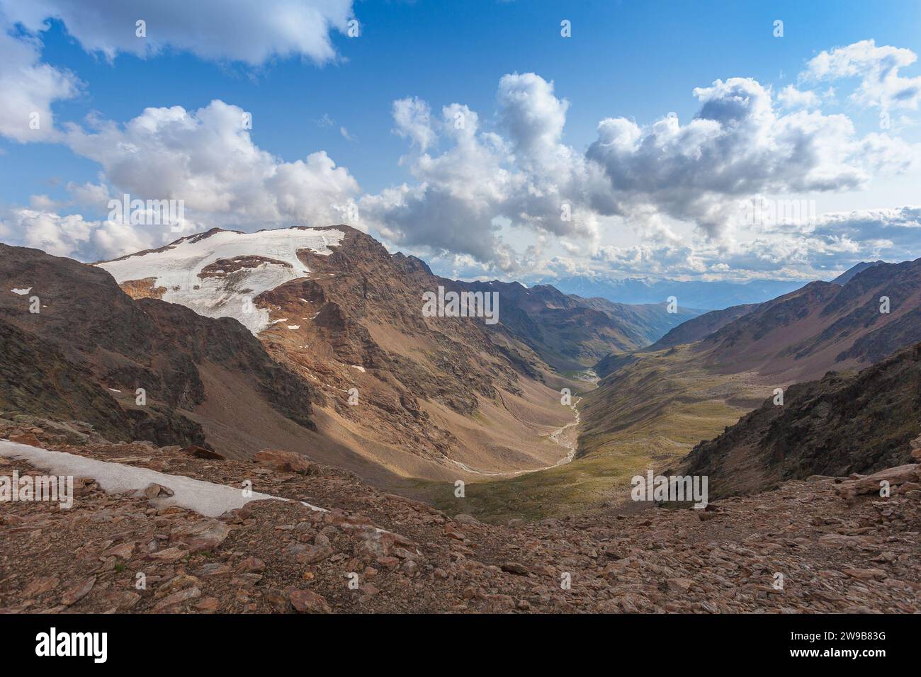Awesome alpine highlands countryside. Alpine valley with glacier and ...