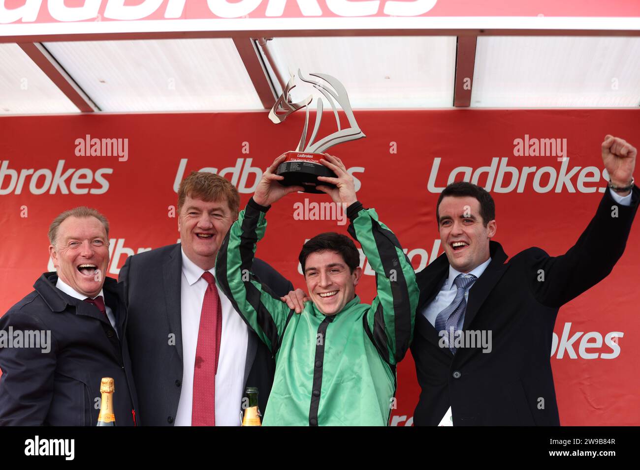 Trainer John "Shark" Hanlon (second left) and jockey Gavin Sheehan ...
