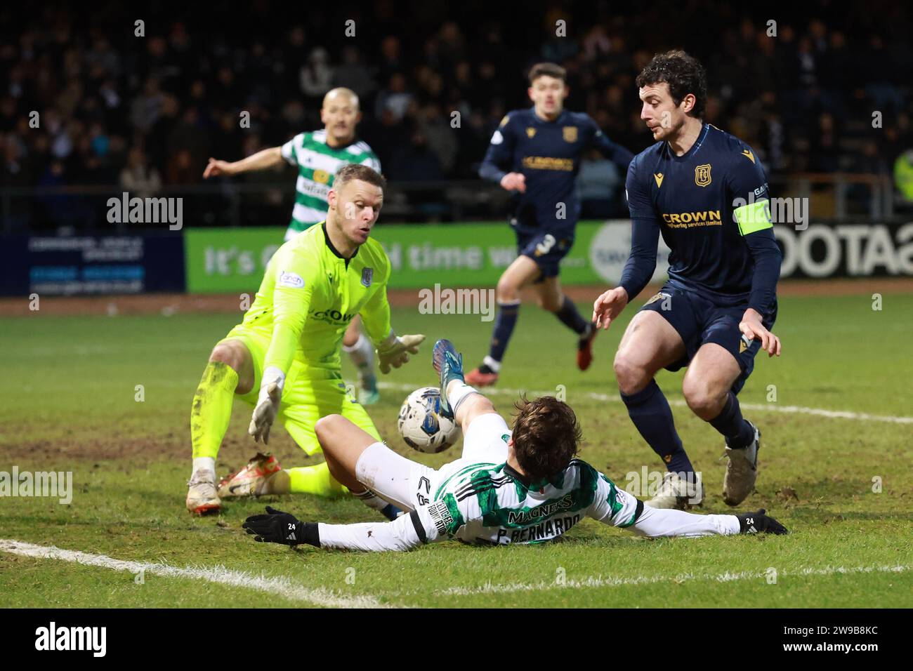 Celtic's Paulo Bernardo (on floor) scores their side's first goal of ...