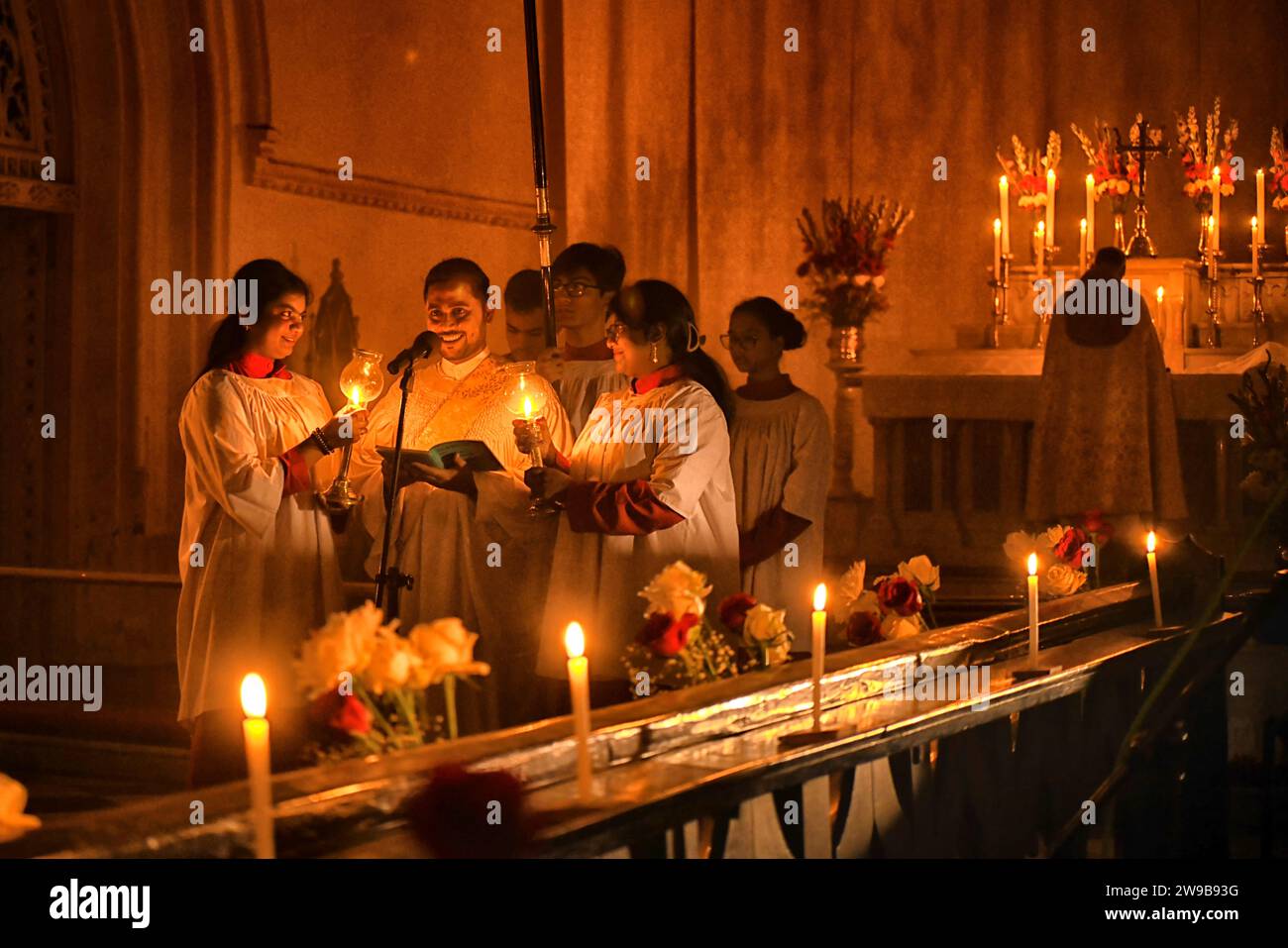 Christian devotees attend a Midnight Mass at St. James Cathedral Church ...
