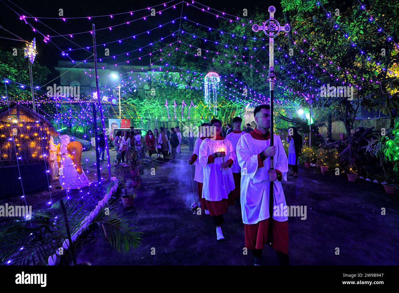 Members of St. James Church seen carrying a cross before the Midnight ...
