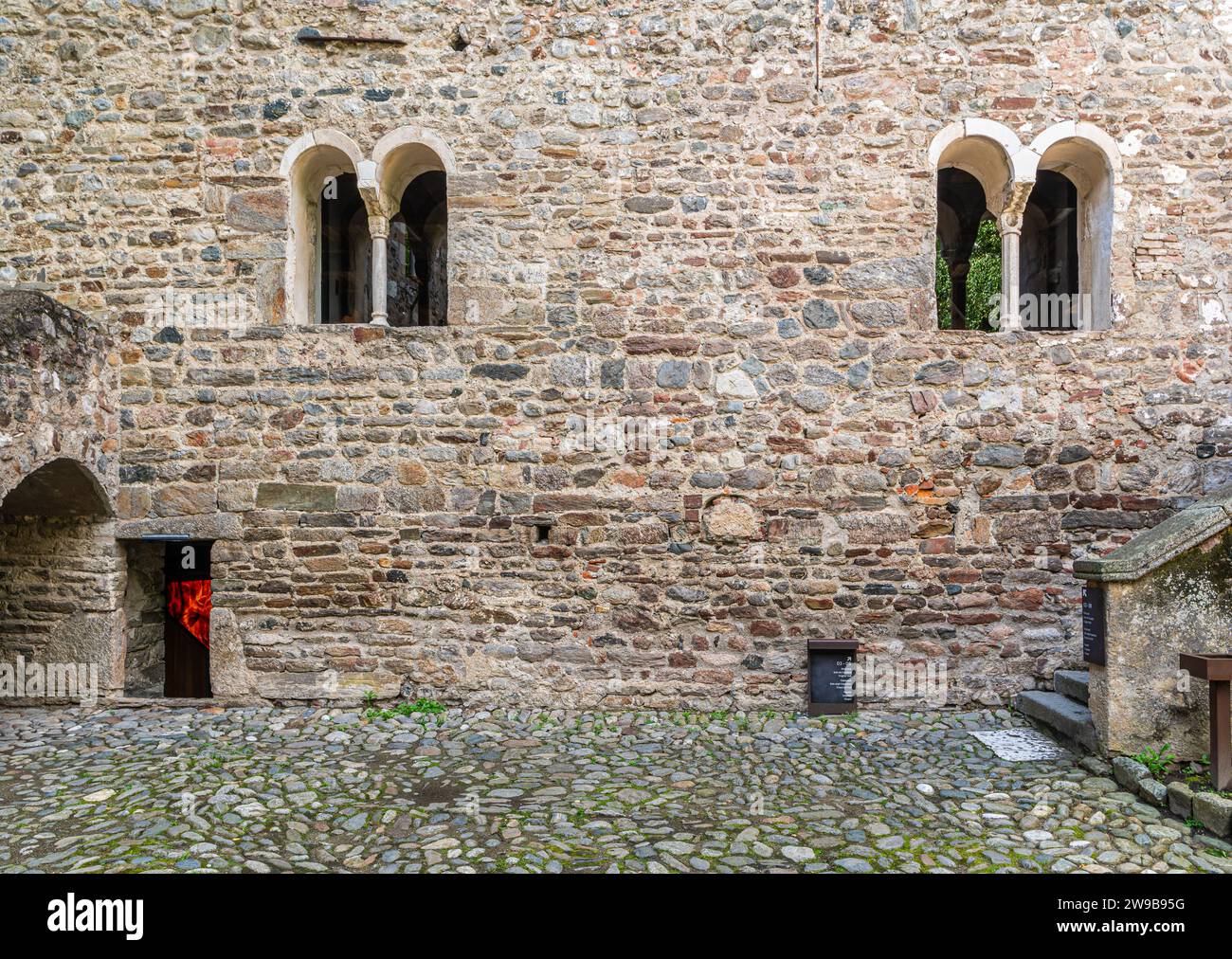 T yrol castle in South Tyrol. Facade with Bifora tye window with ...