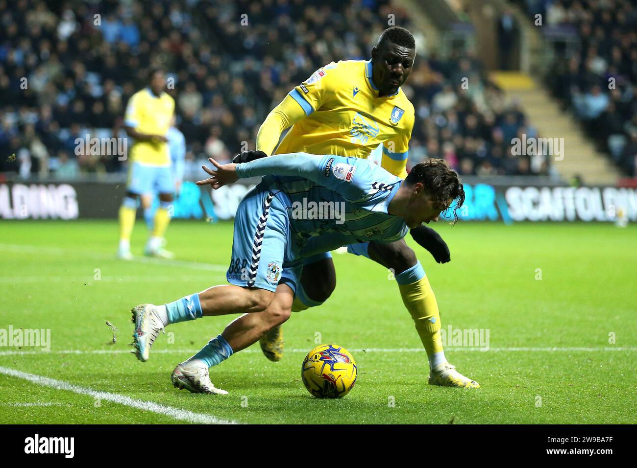 Coventry City's Callum O'Hare (right) and Sheffield Wednesday's Bambo ...