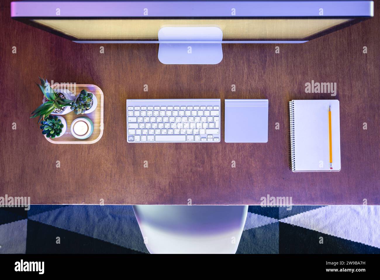 Top view, computer on a wooden table, work desk Stock Photo - Alamy