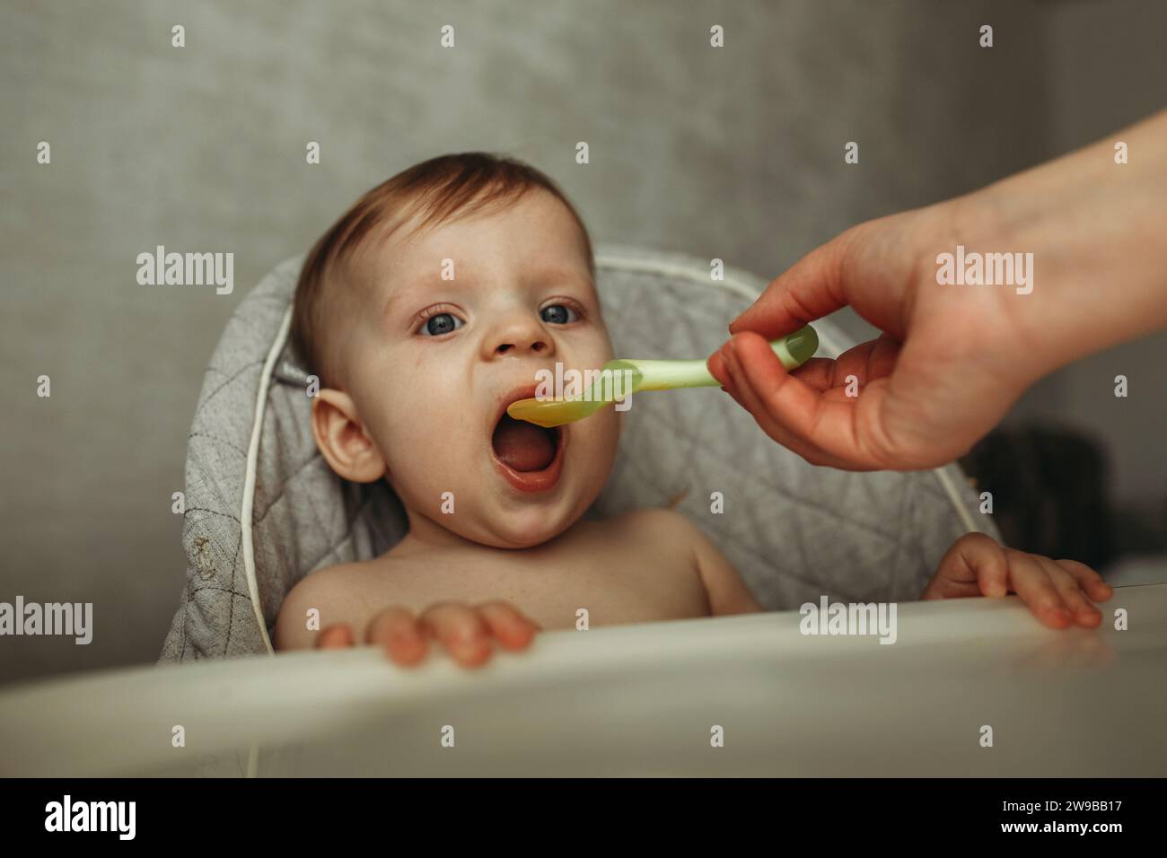 Portrait eating small baby child hi-res stock photography and images ...