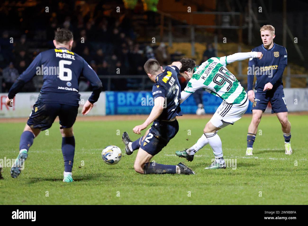 Celtic's Mikey Johnston (third from left) scores their side's third ...