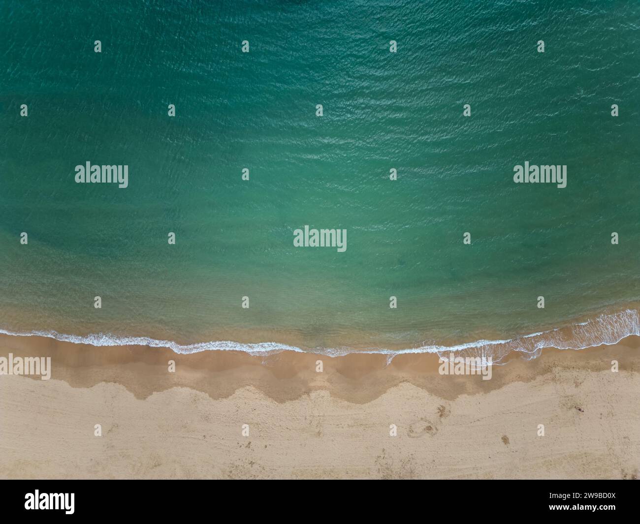 clean sea water and tropical beach, idyllic coast of blue ocean, aerial ...