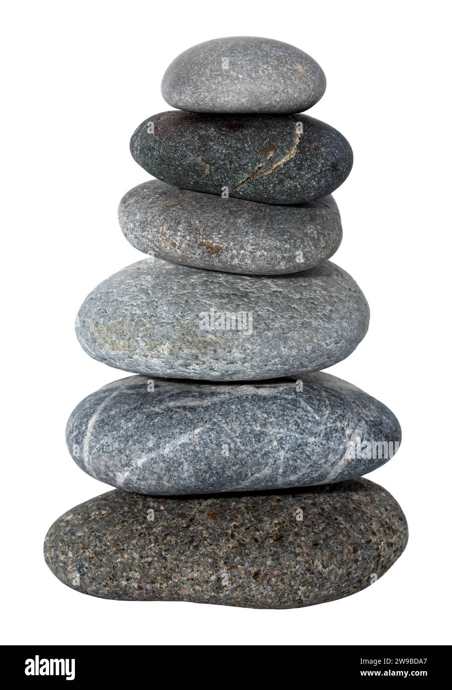 Natural gray stones lie on top of each other on a white background ...